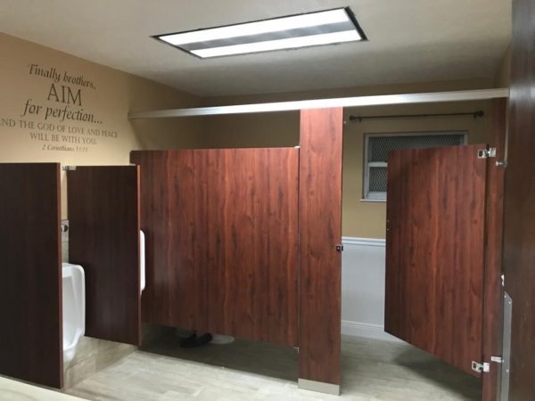 Inswing vs Outswing Partition Doors | One Point Partitions